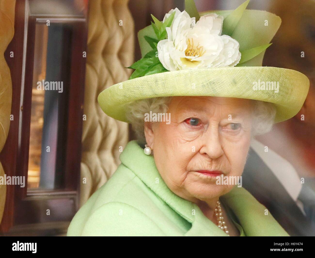 Queen Elizabeth II leaves in a state carriage after a ceremonial ...