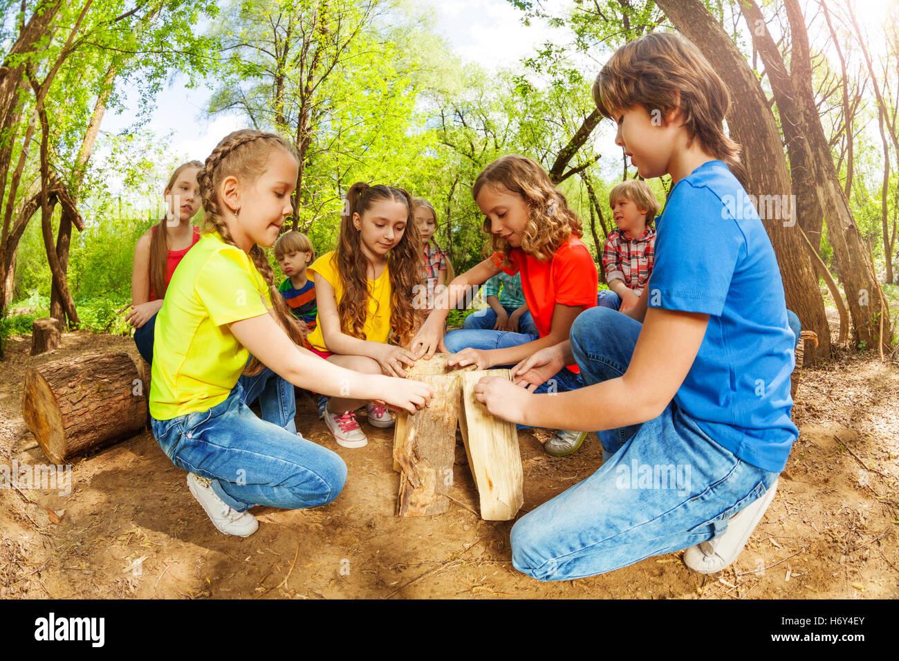 Children playing in the forest sunny hi-res stock photography and ...