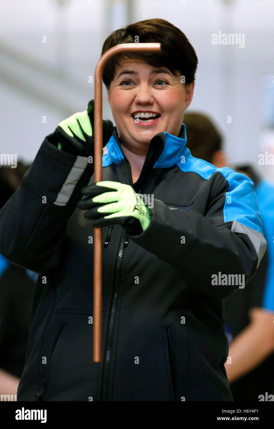 Conservative leader Ruth Davidson uses a pipe-bending tool during a ...