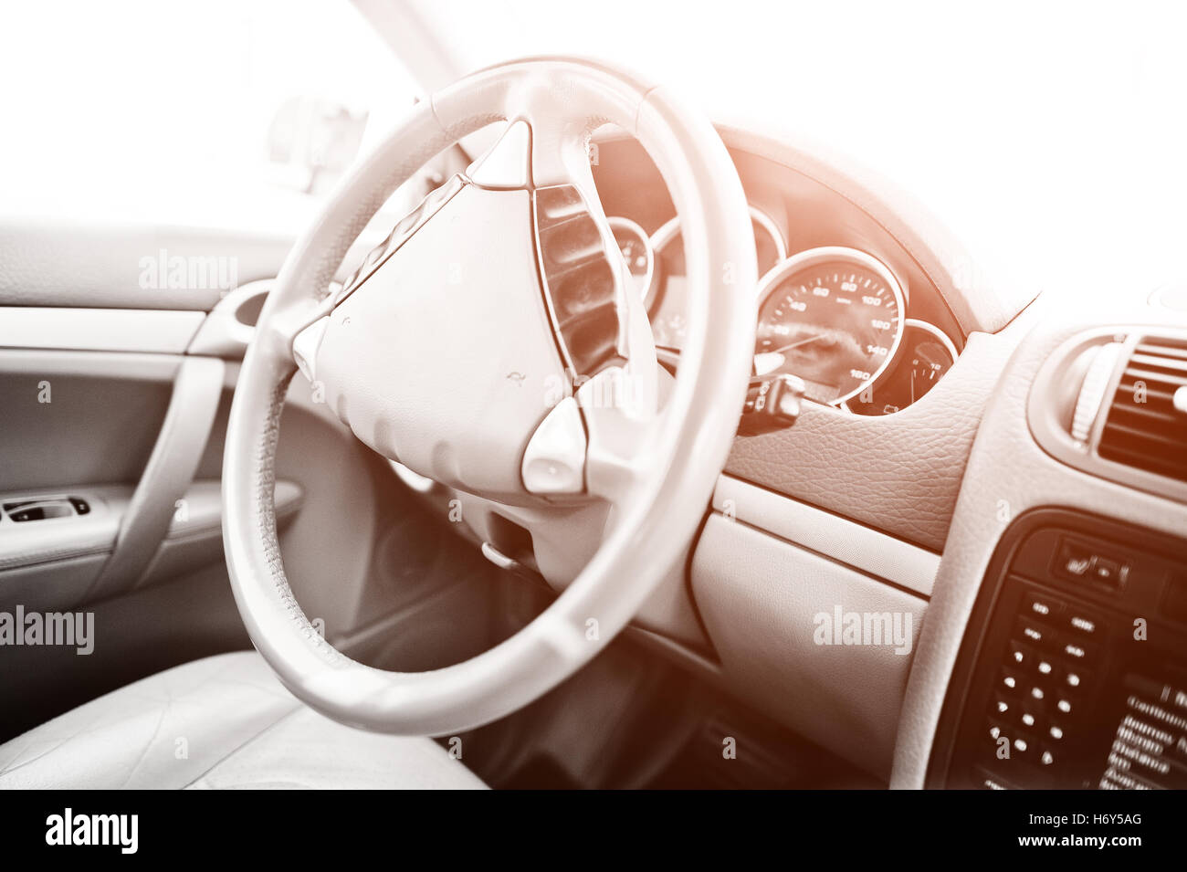 Steering wheel of luxury car Stock Photo - Alamy