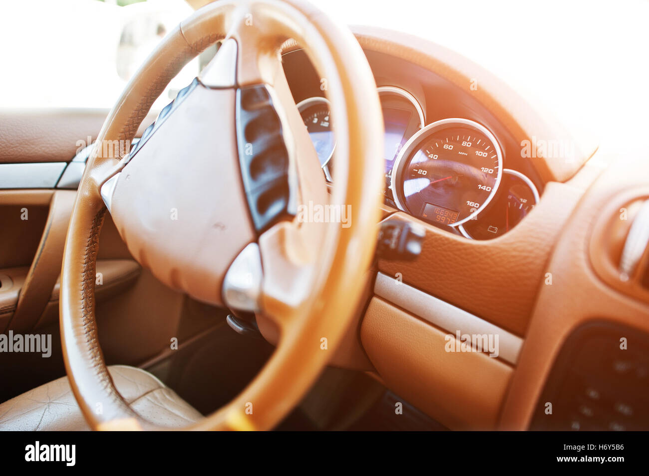 Steering wheel of luxury car Stock Photo - Alamy