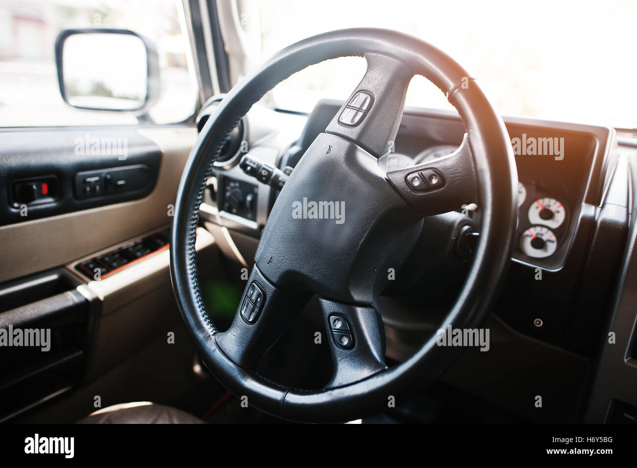 Steering wheel of luxury car Stock Photo - Alamy