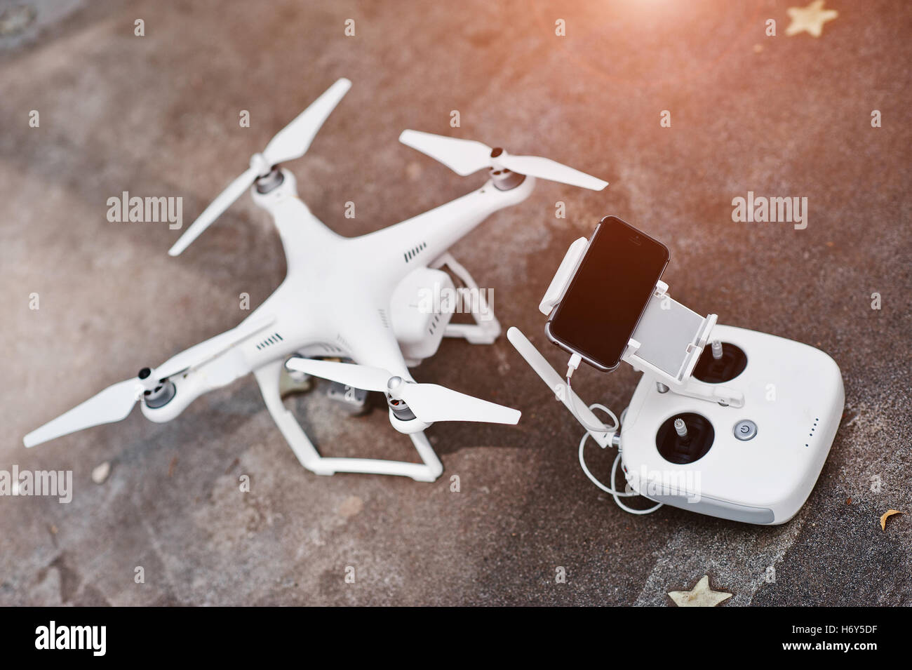 Drone quadcopter with remote control and gadget Stock Photo - Alamy