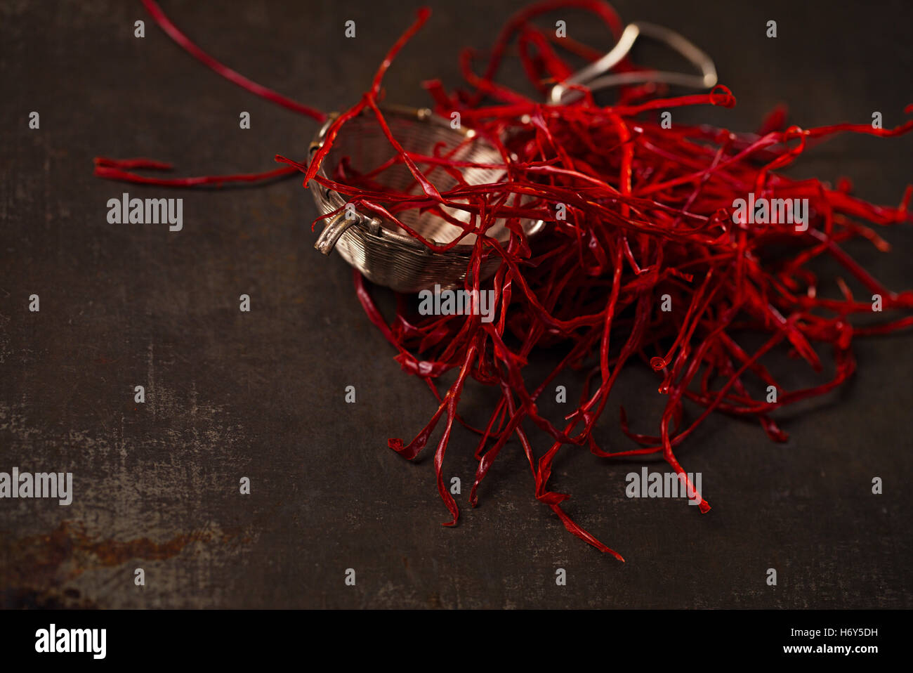 extra hot red chilli pepper strings, threads on metal background Stock ...