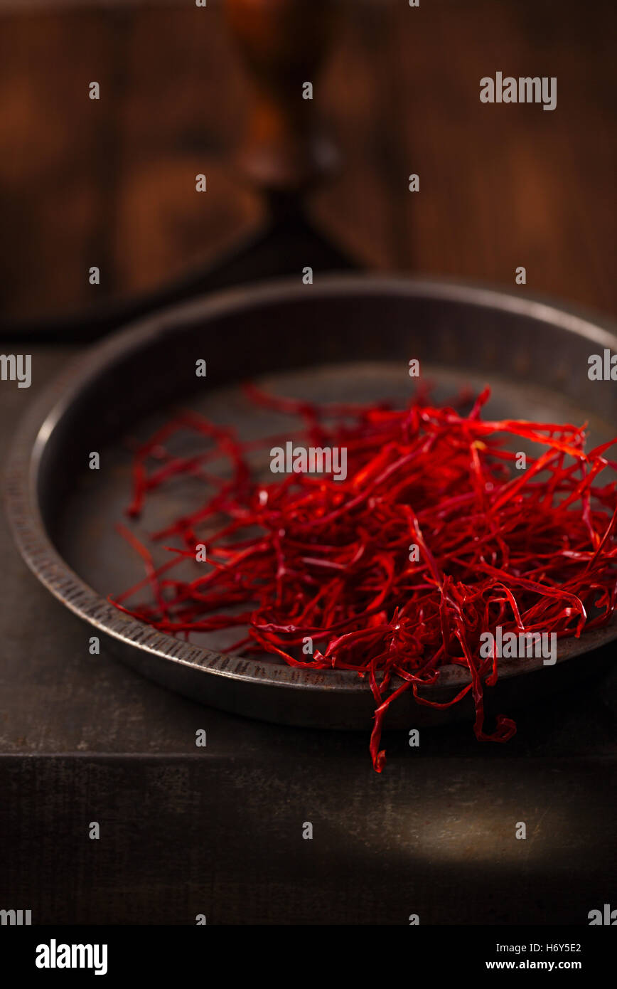 extra hot red chilli pepper strings, threads on metal background Stock ...
