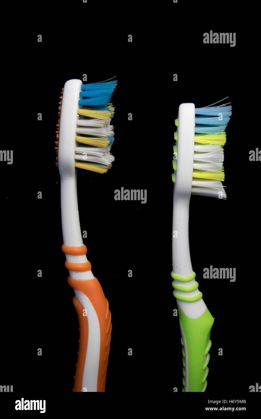 Used Toothbrush on Black Background Stock Photo - Alamy