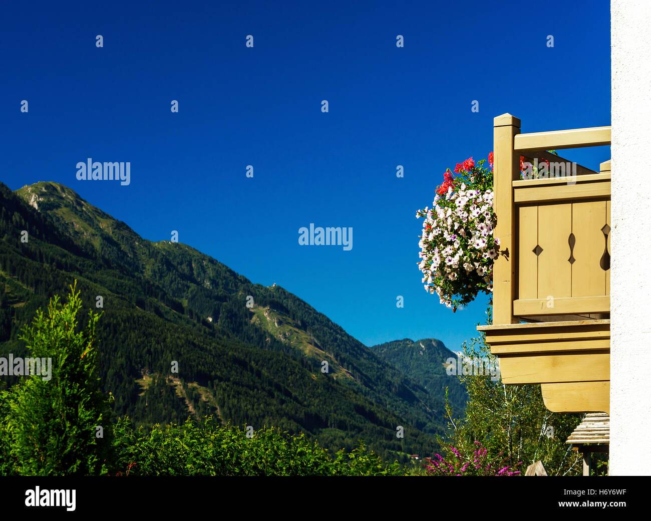 Beautiful alpine summer landscape. Mountains and sun, blue sky, calm ...