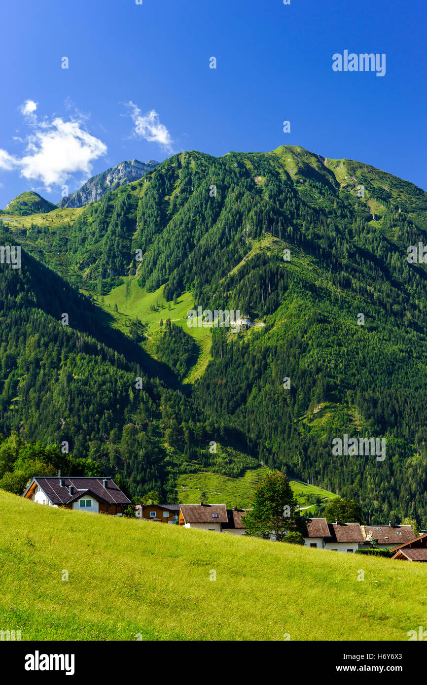 Beautiful alpine summer landscape. Mountains and sun, blue sky, calm ...