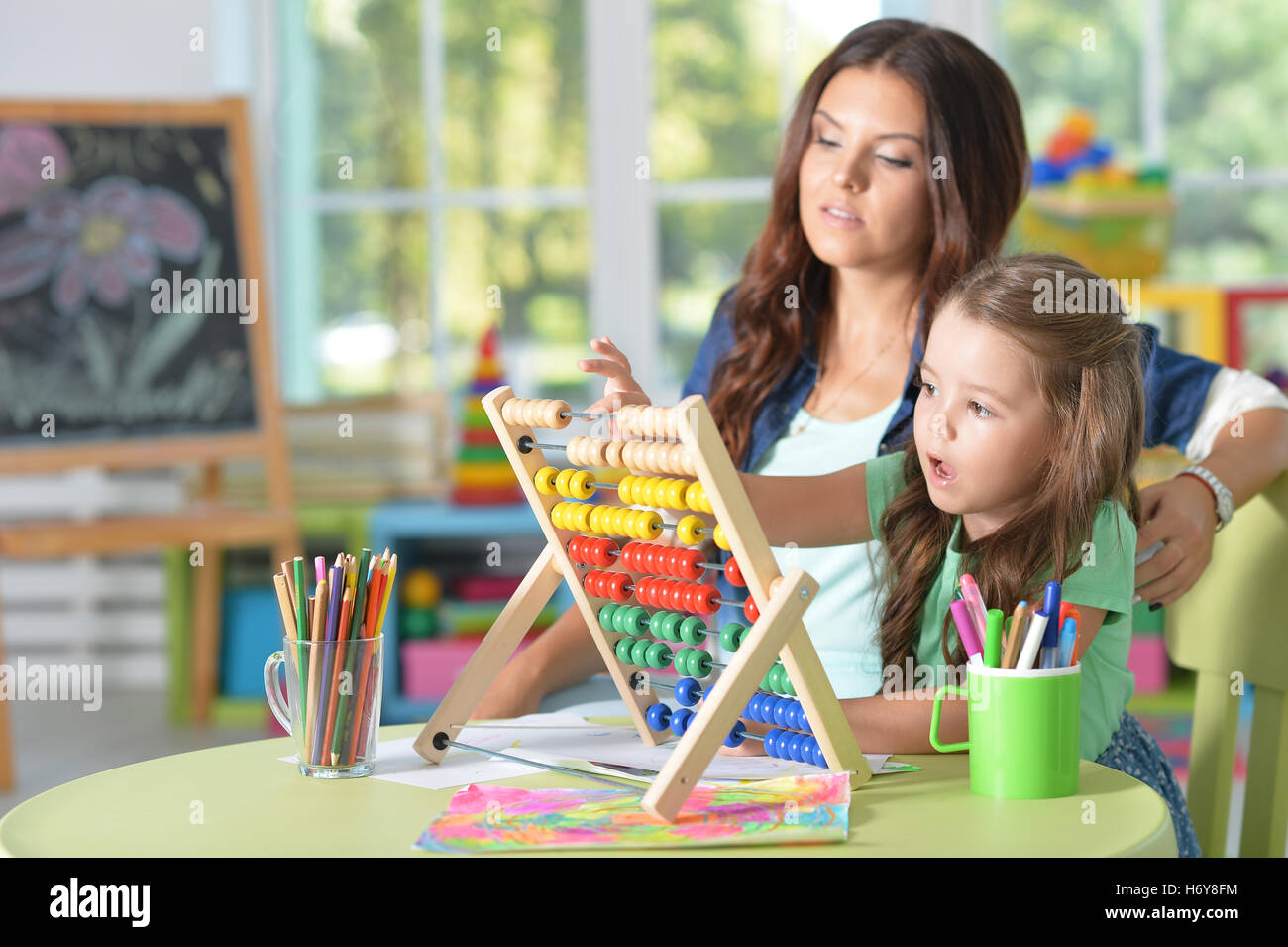 girl doing math exercises Stock Photo - Alamy