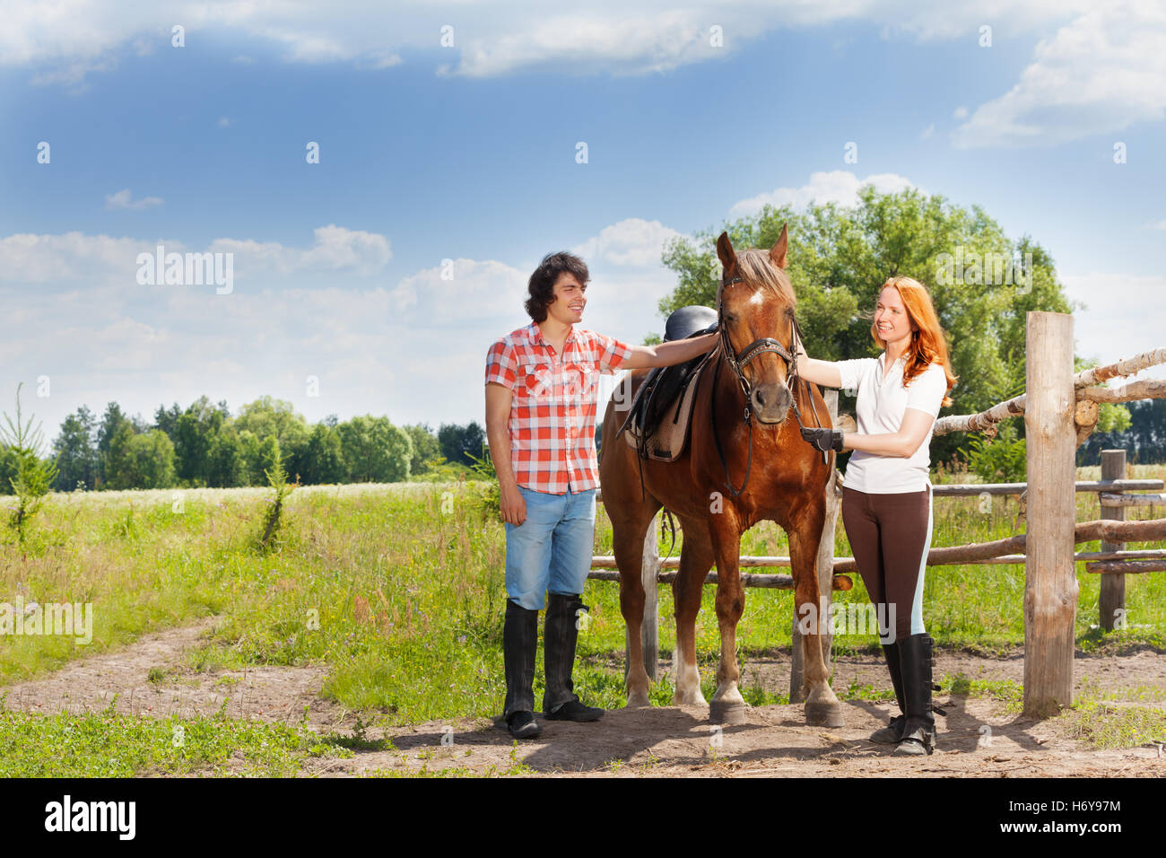 Man woman walking horse hi-res stock photography and images - Alamy