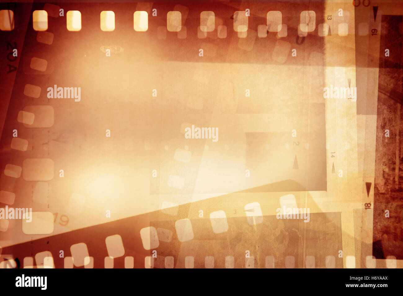 Film negative frames on orange background Stock Photo - Alamy