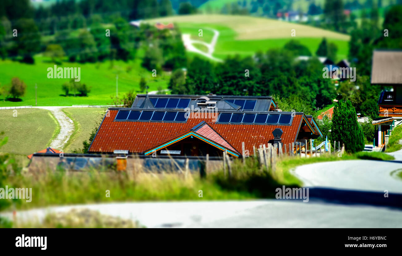Tilt-shift aerial view of little austrian city in the valley, Austria ...