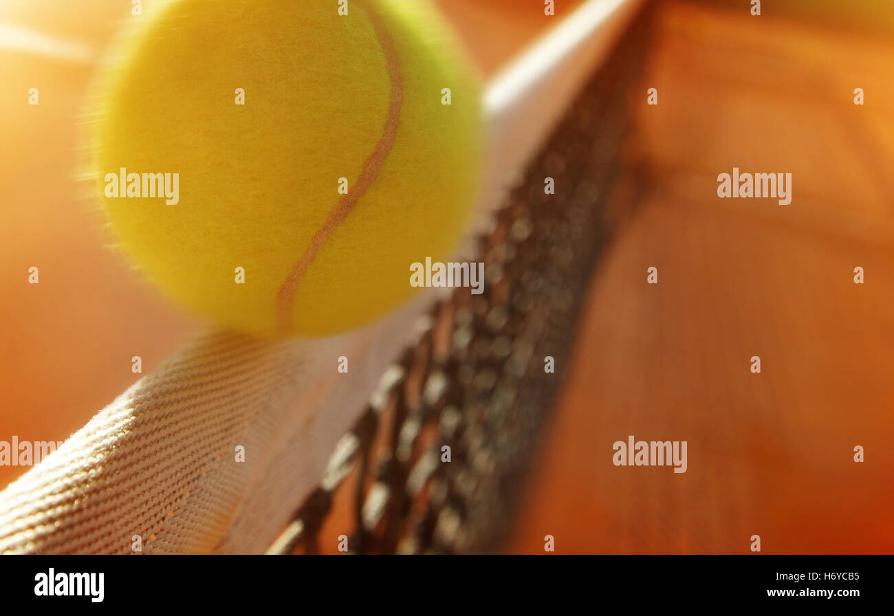 Tennis ball hitting the net Stock Photo - Alamy