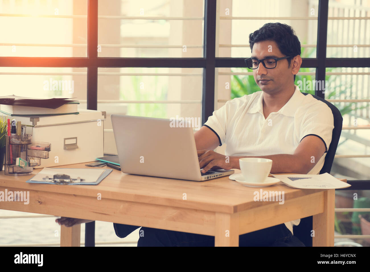 indian man working at office Stock Photo - Alamy