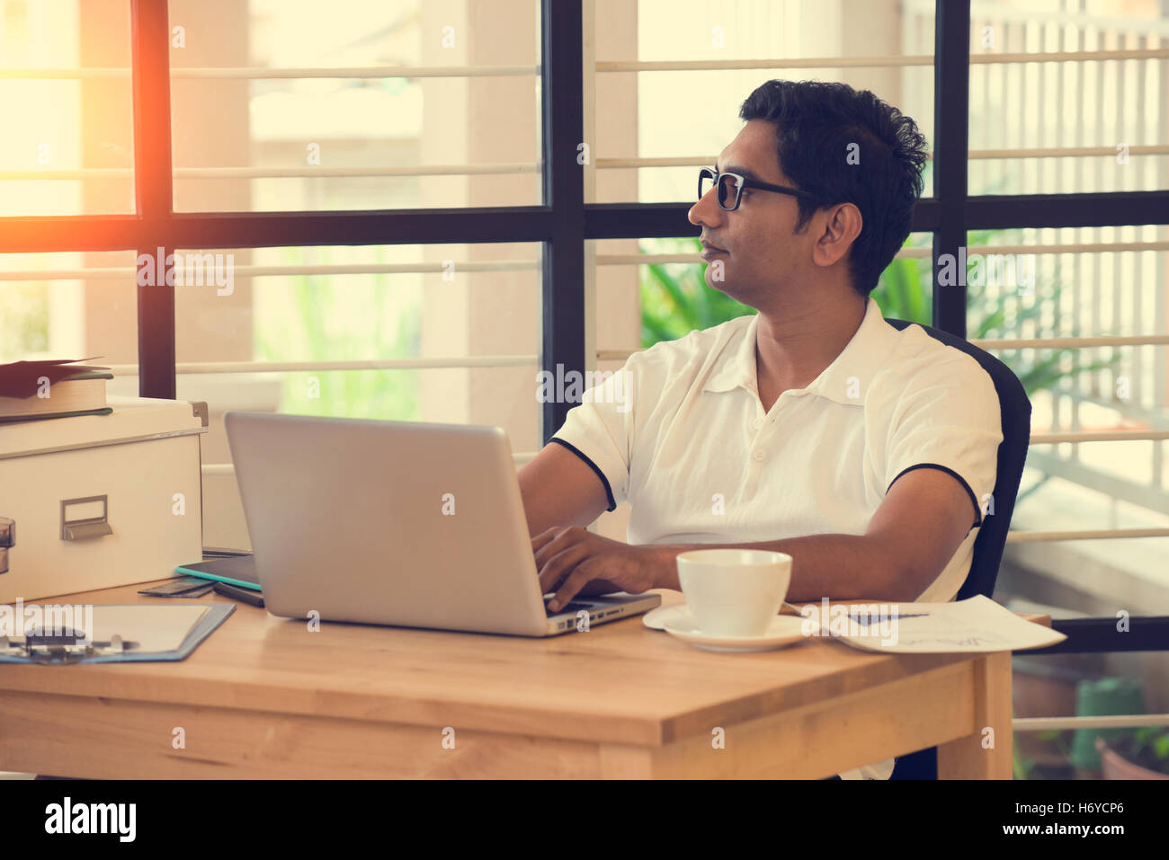 indian man working at office Stock Photo - Alamy