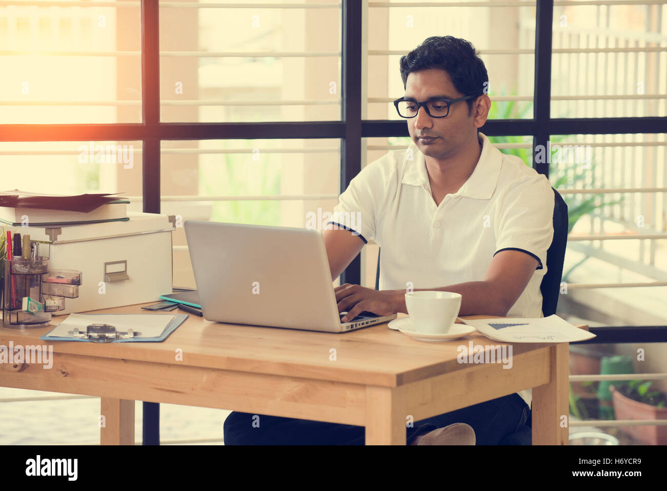 indian man working at office Stock Photo - Alamy
