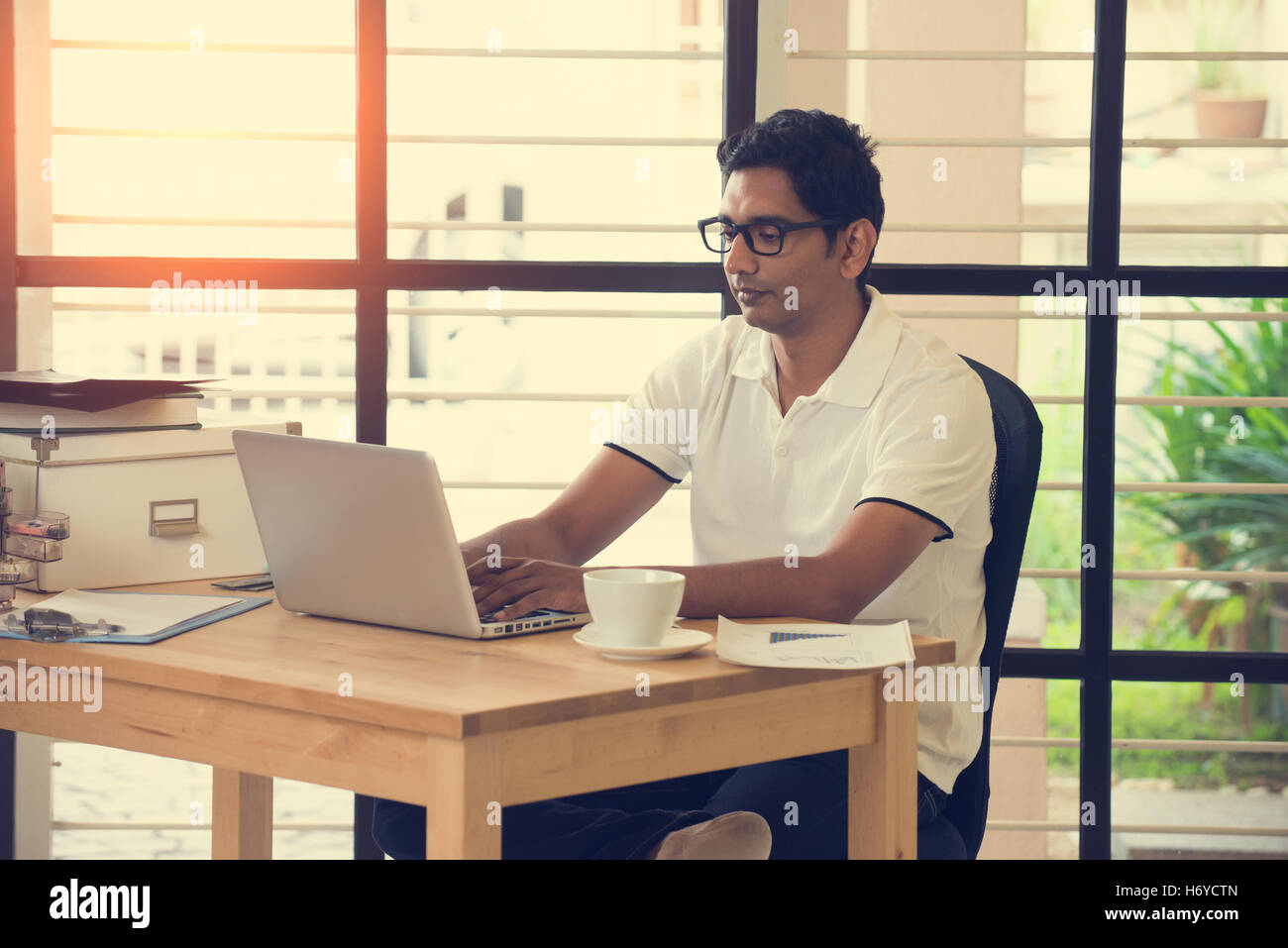 indian man working at office Stock Photo - Alamy