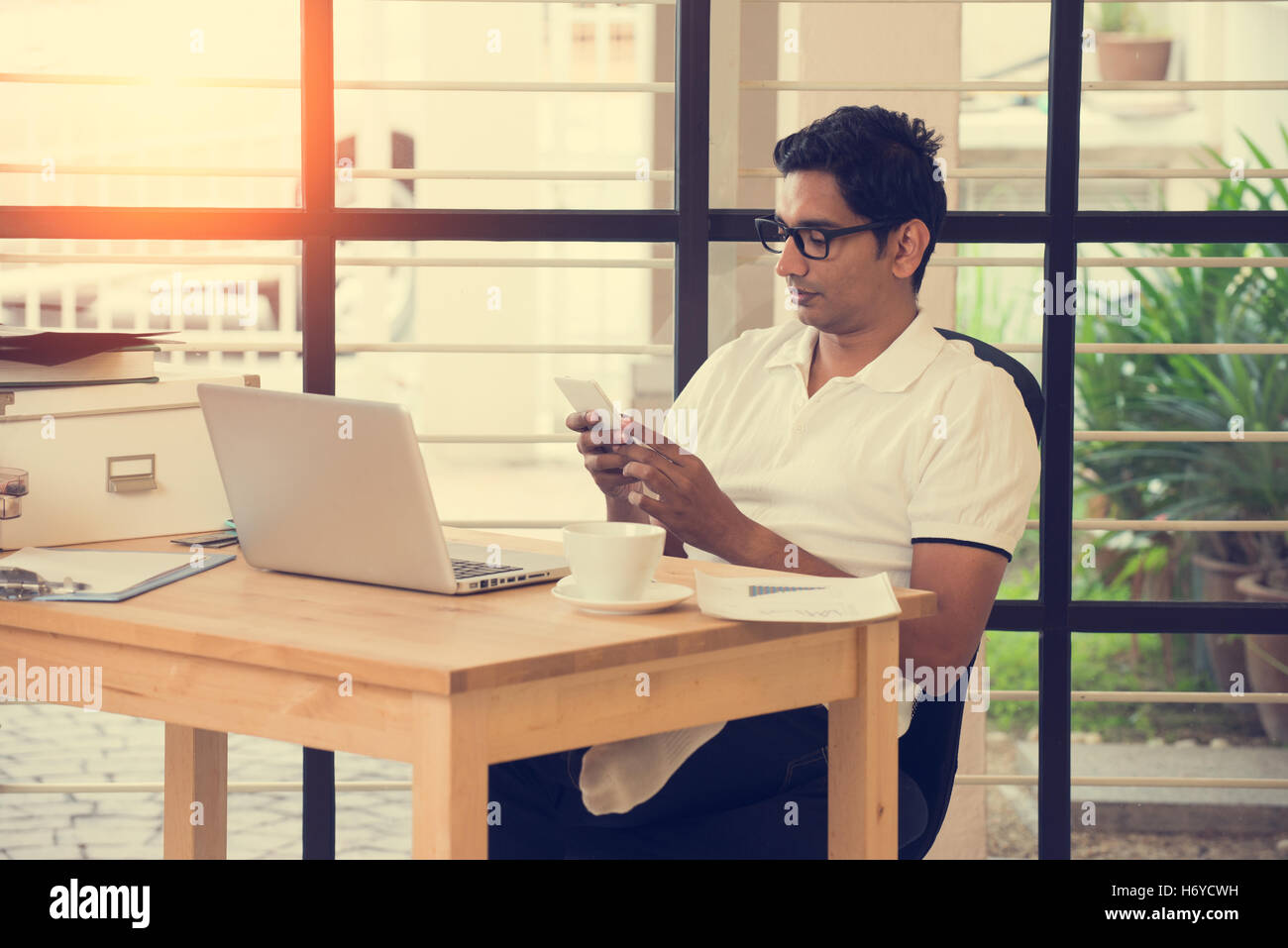 indian man working at office Stock Photo - Alamy