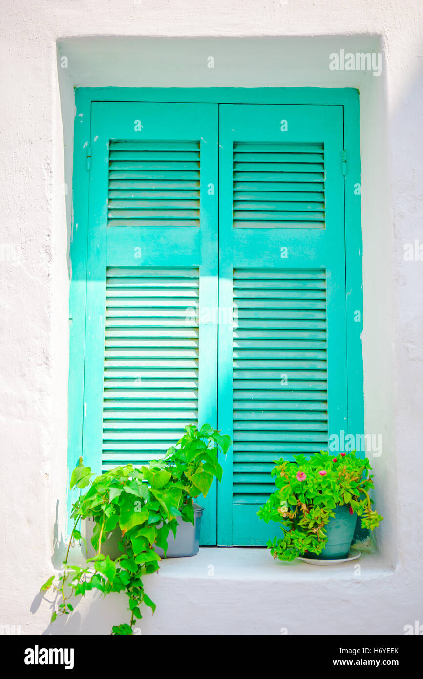 Traditional colorful window in the narrow streets of Mykonos, Greece ...
