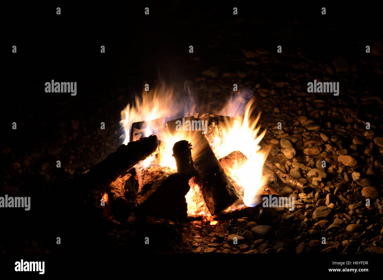 warm and cozy campfire in night Stock Photo - Alamy