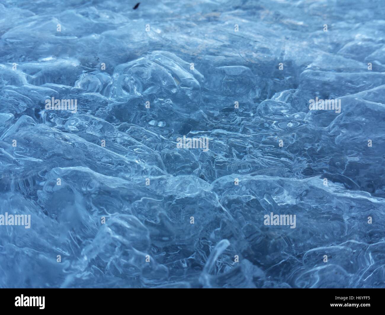 beautiful fresh water blue ice background in northern wilderness Stock ...