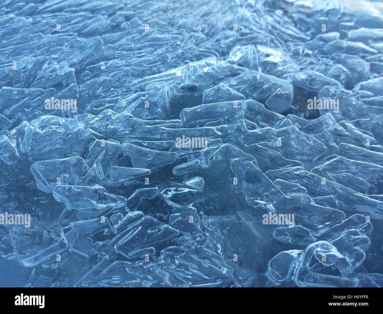 beautiful fresh water blue ice background in northern wilderness Stock ...