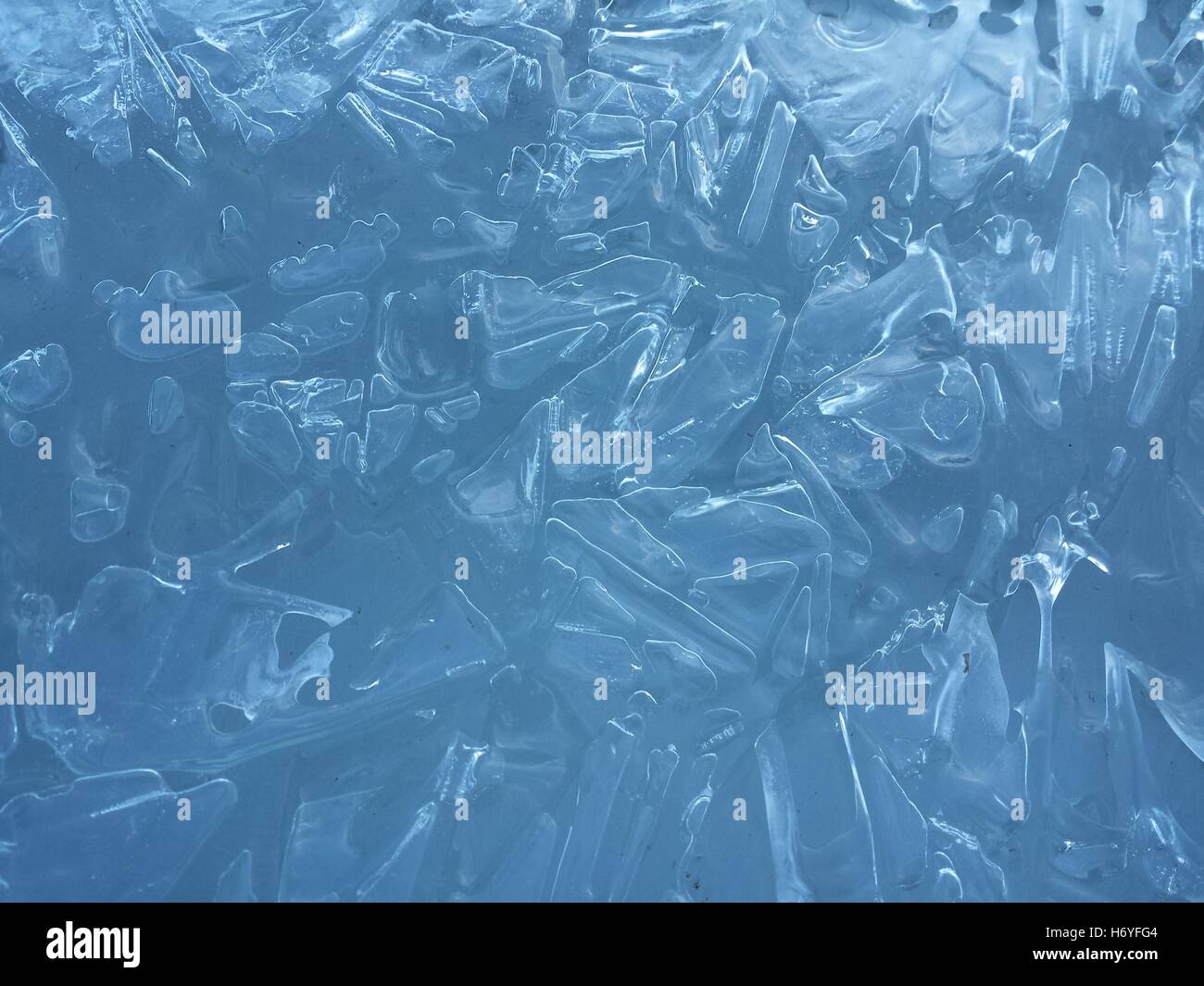 beautiful fresh water blue ice background in northern wilderness Stock ...