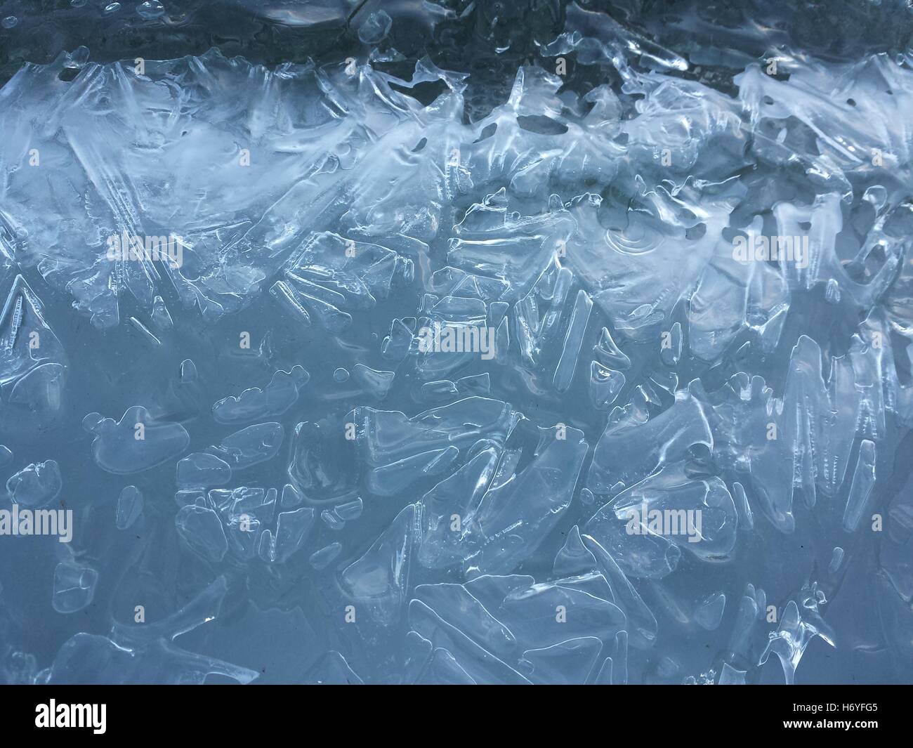 beautiful fresh water blue ice background in northern wilderness Stock ...