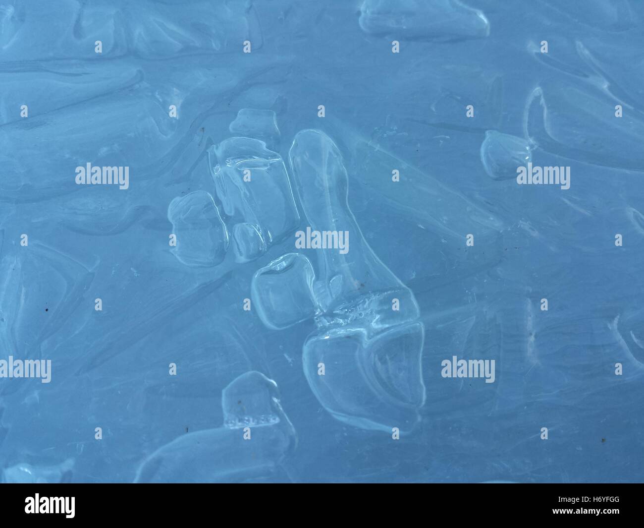 beautiful fresh water blue ice background in northern wilderness Stock ...