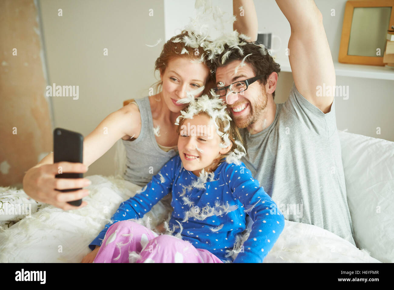 Couple pillow fight feathers hi-res stock photography and images - Alamy