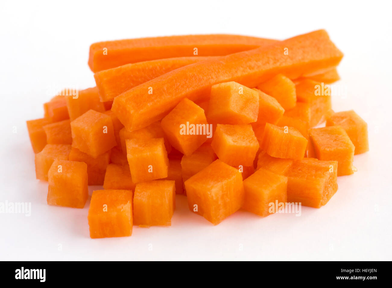 Carrot neatly chopped into cubes ready to be used Stock Photo - Alamy