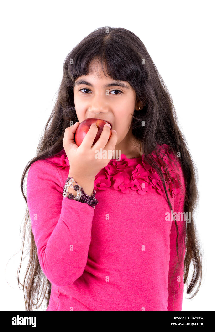 Young Girl Eating Apple Isolated on White Background Stock Photo - Alamy