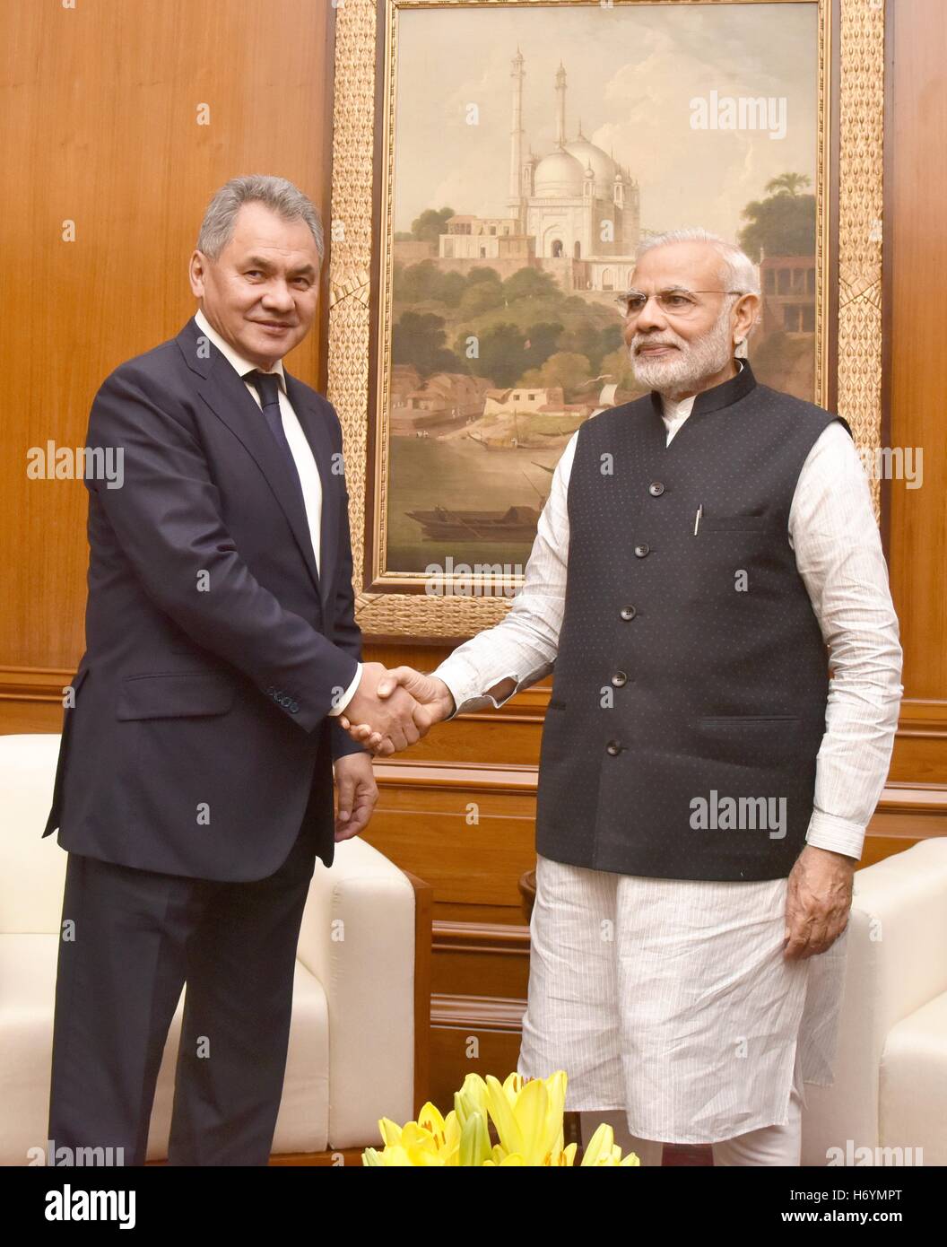 Indian Prime Minister Narendra Modi welcomes Russian Defense Minister Sergei Shoigu for a ...
