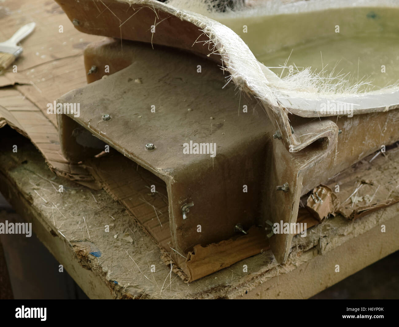 Fiberglass in boat production; details and processing Stock Photo - Alamy