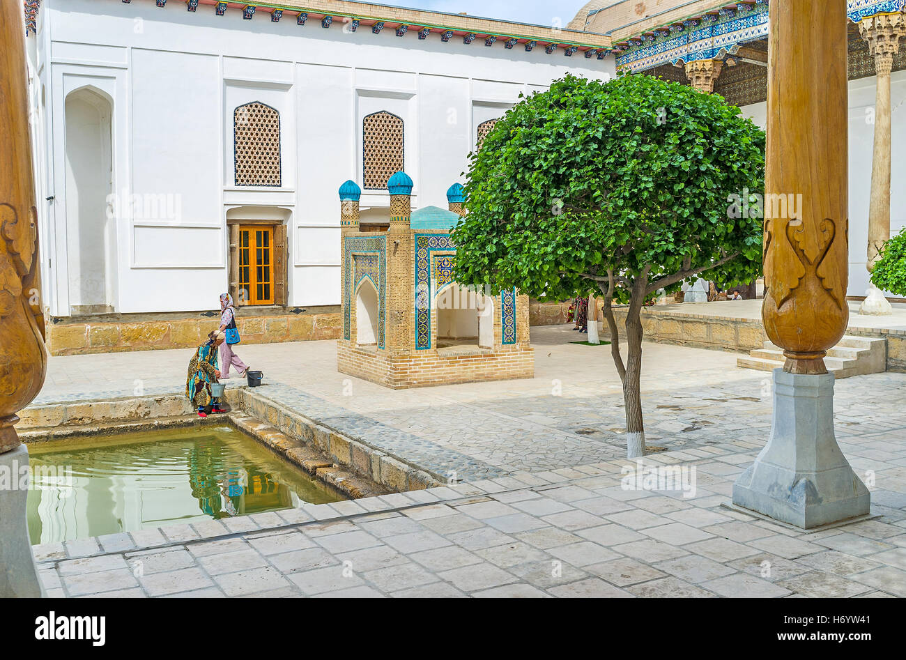 The tiny arched saqqakhana drinking fountain decorated with islamic ...
