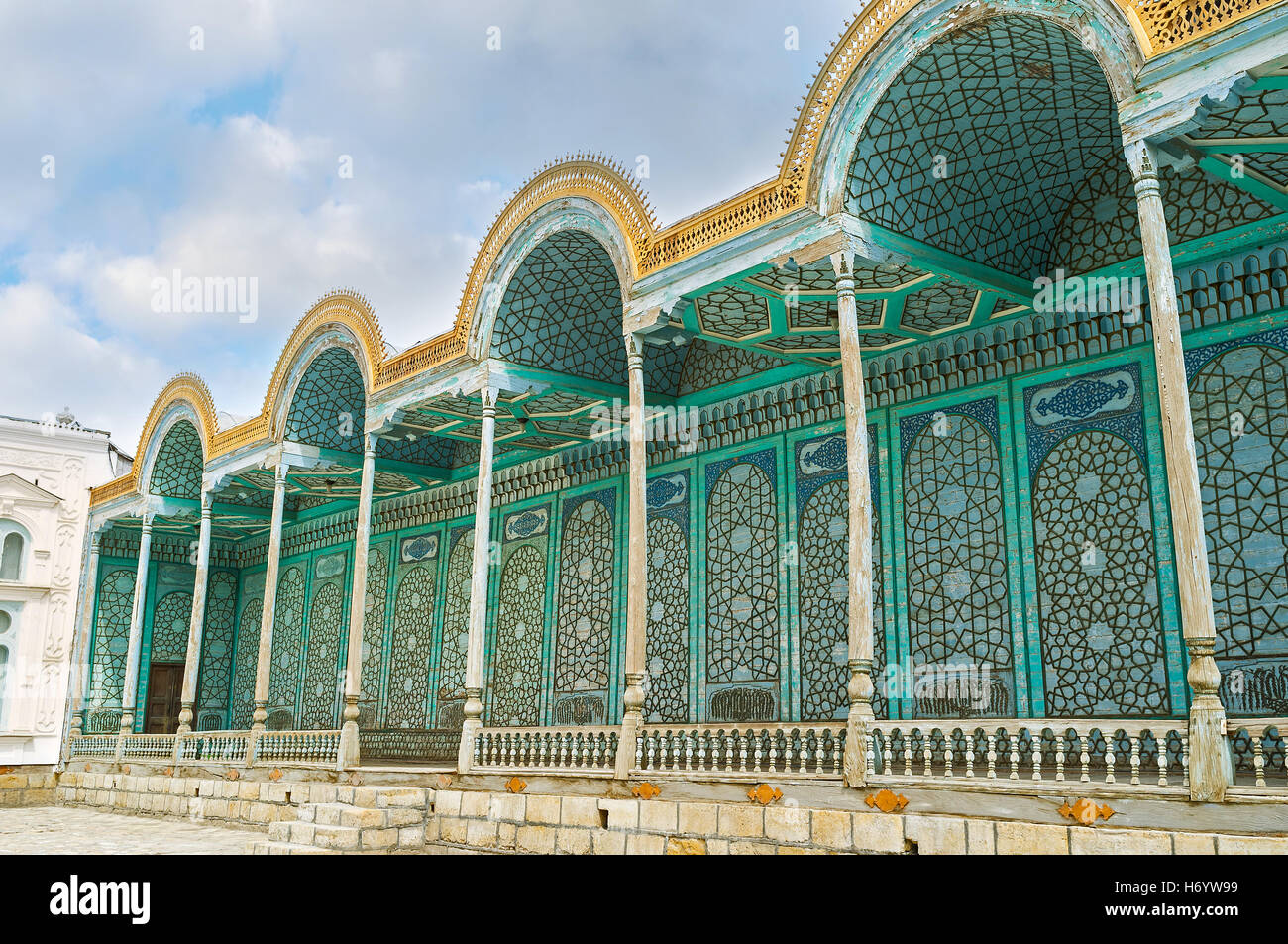 The carved wooden arched gallery of Sitorai Mokhi-Khosa Palace covered ...