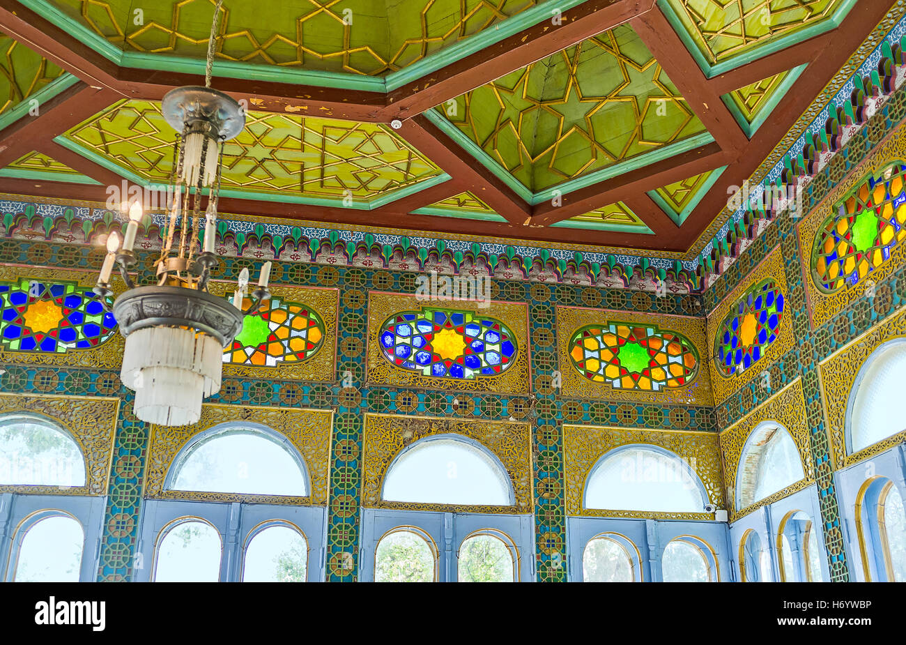 The small chamber with large glass windows and carved wooden ceiling in ...