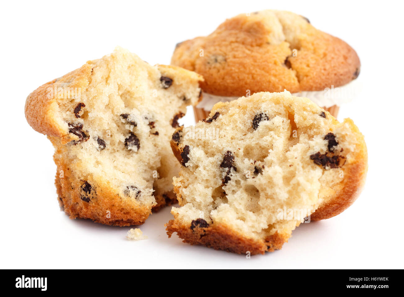 Broken light chocolate chip muffin on white Stock Photo - Alamy
