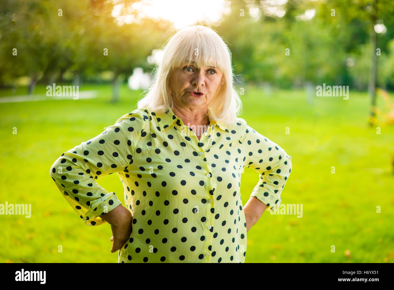 Upset senior woman Stock Photo - Alamy