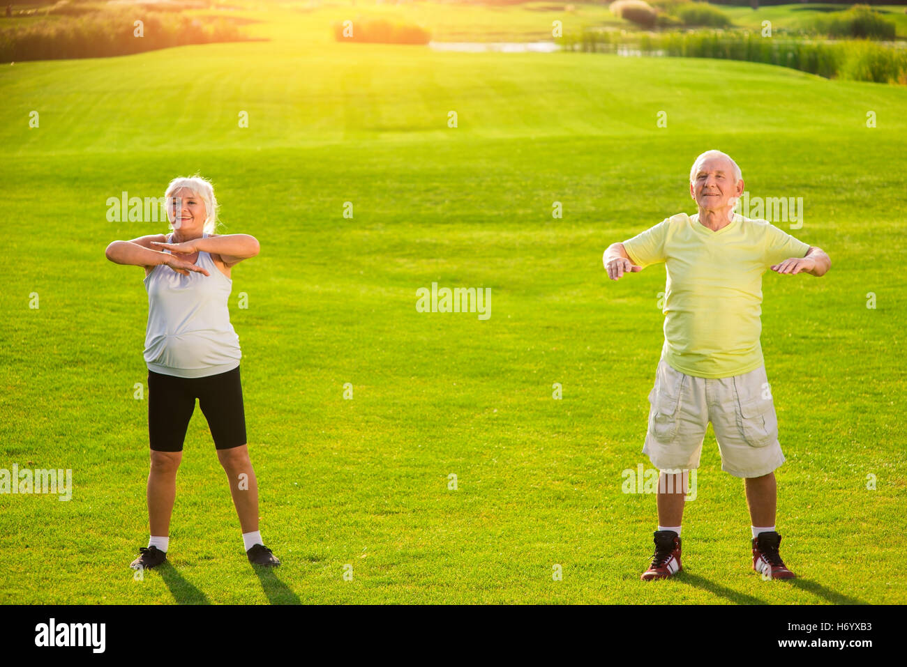 Happy senior grandfather man exercising hi-res stock photography and ...