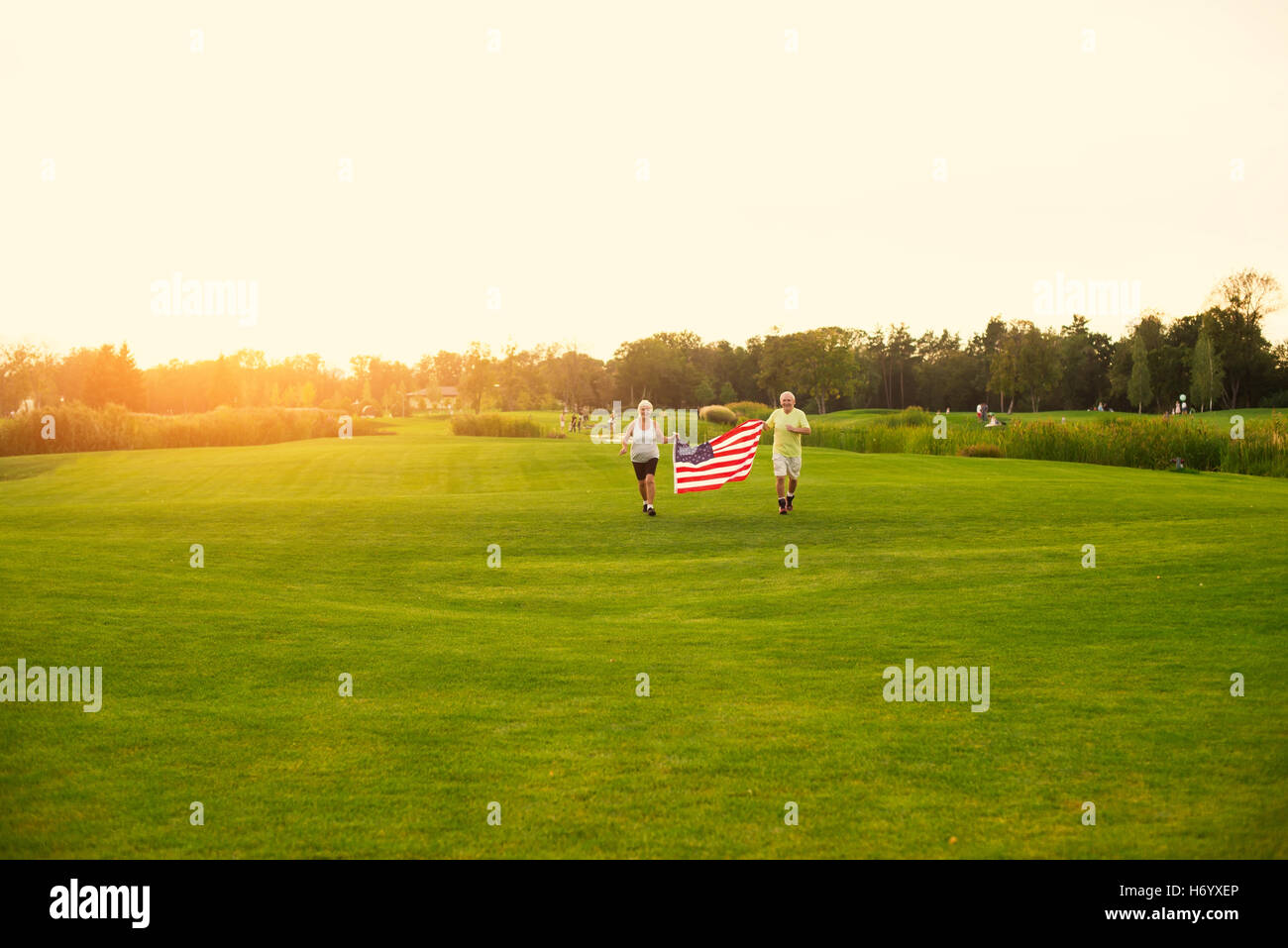 Man carrying us flag hi-res stock photography and images - Alamy