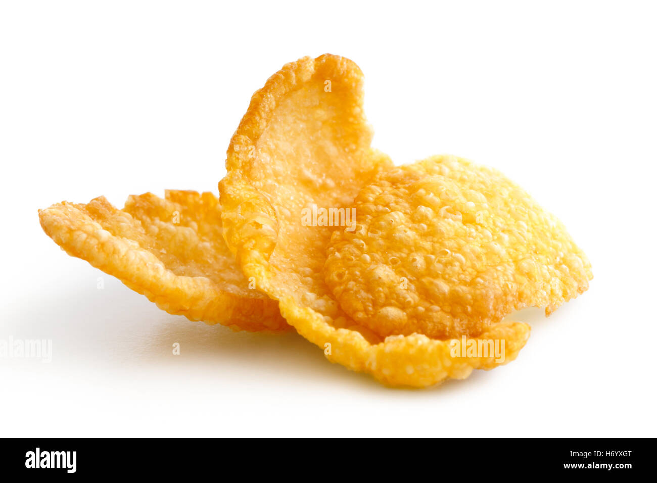Group of three cornflakes isolated on white Stock Photo - Alamy