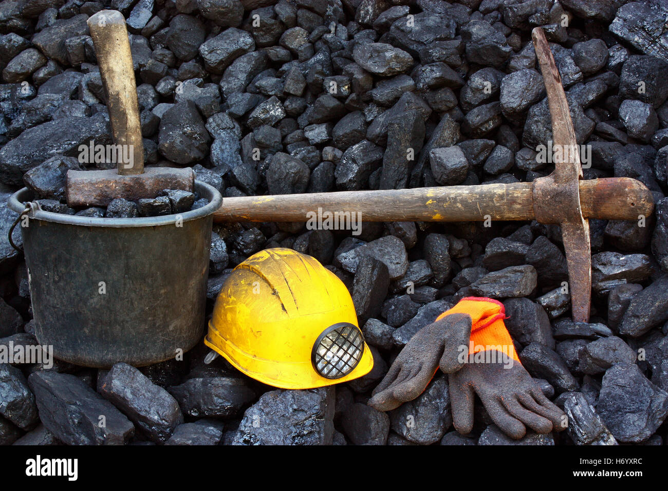 Mining tools on a background of coal Stock Photo - Alamy