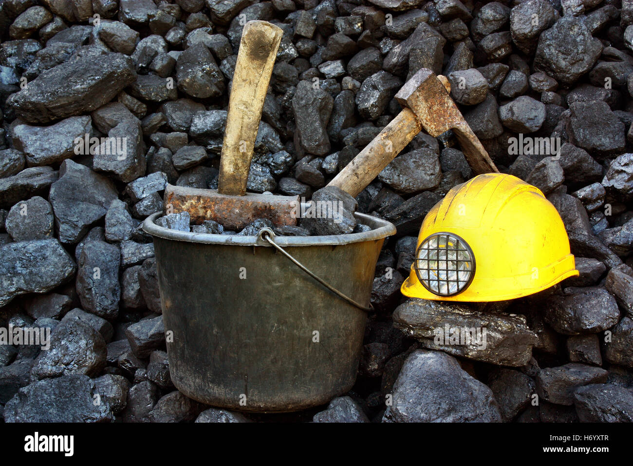 Mining tools on a background of coal Stock Photo - Alamy