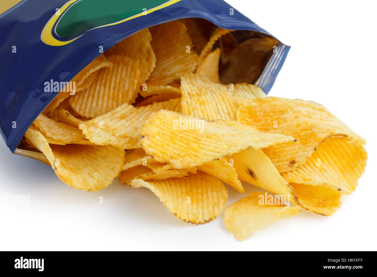 Crinkle cut crisps spilling out of a foil packet Stock Photo - Alamy