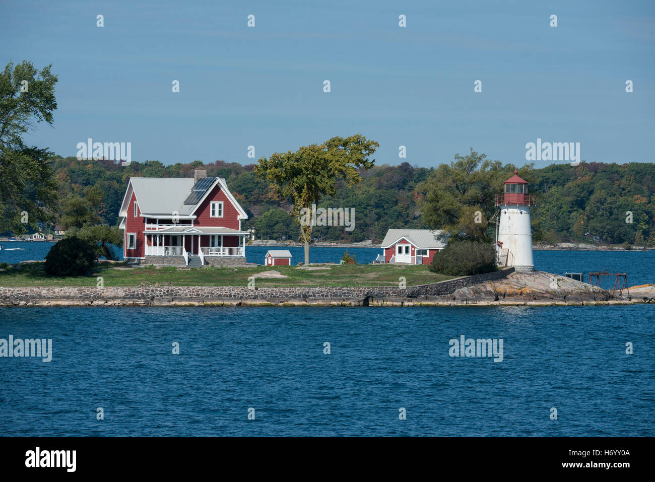 New York, Thousand Islands. Typical view of island home along the St ...