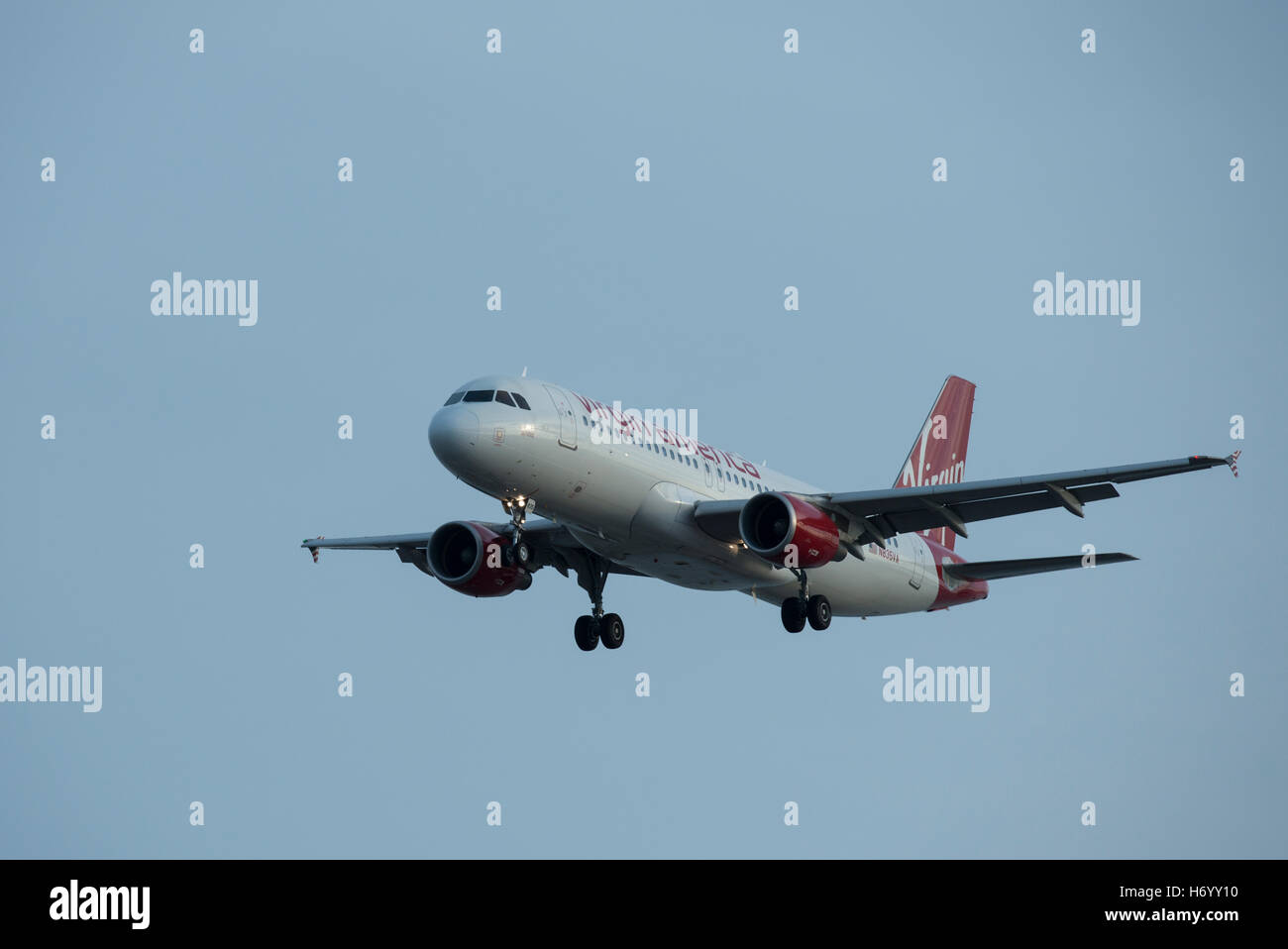 Massachusetts, Boston. Virgin Airlines jet flying into Boston Logan ...