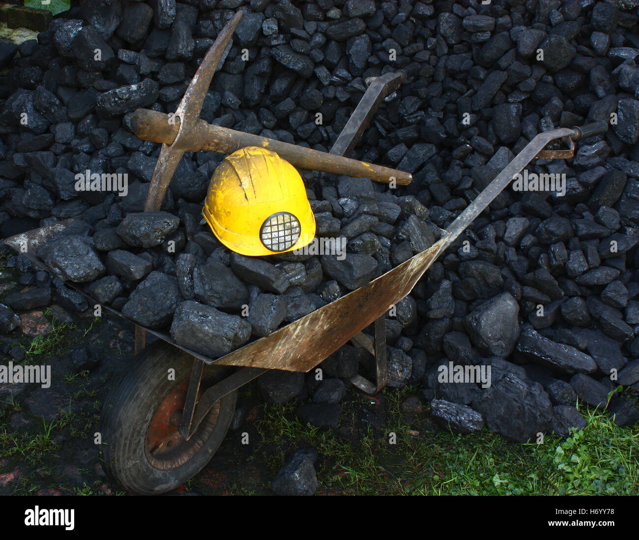 Mining tools on a background of coal Stock Photo - Alamy