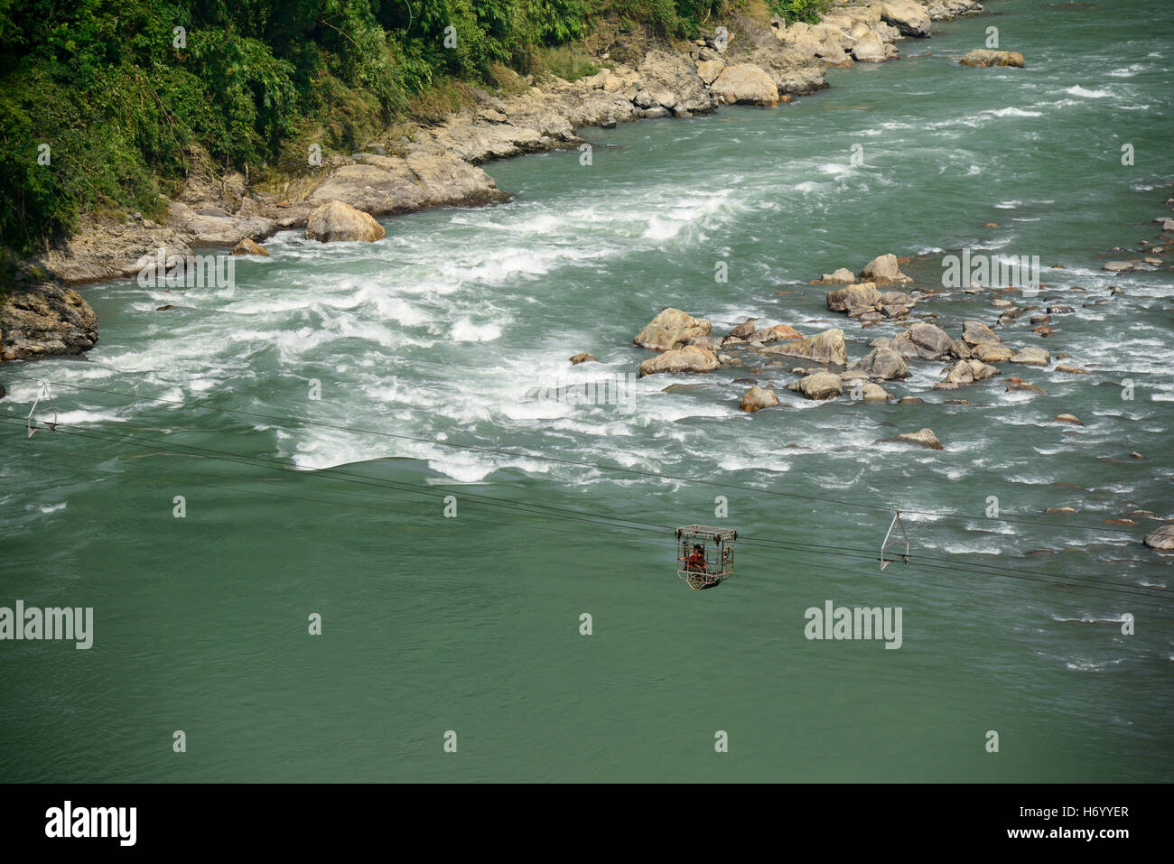 NEPAL , Mugling, village Karantar, children in cable car on river ...