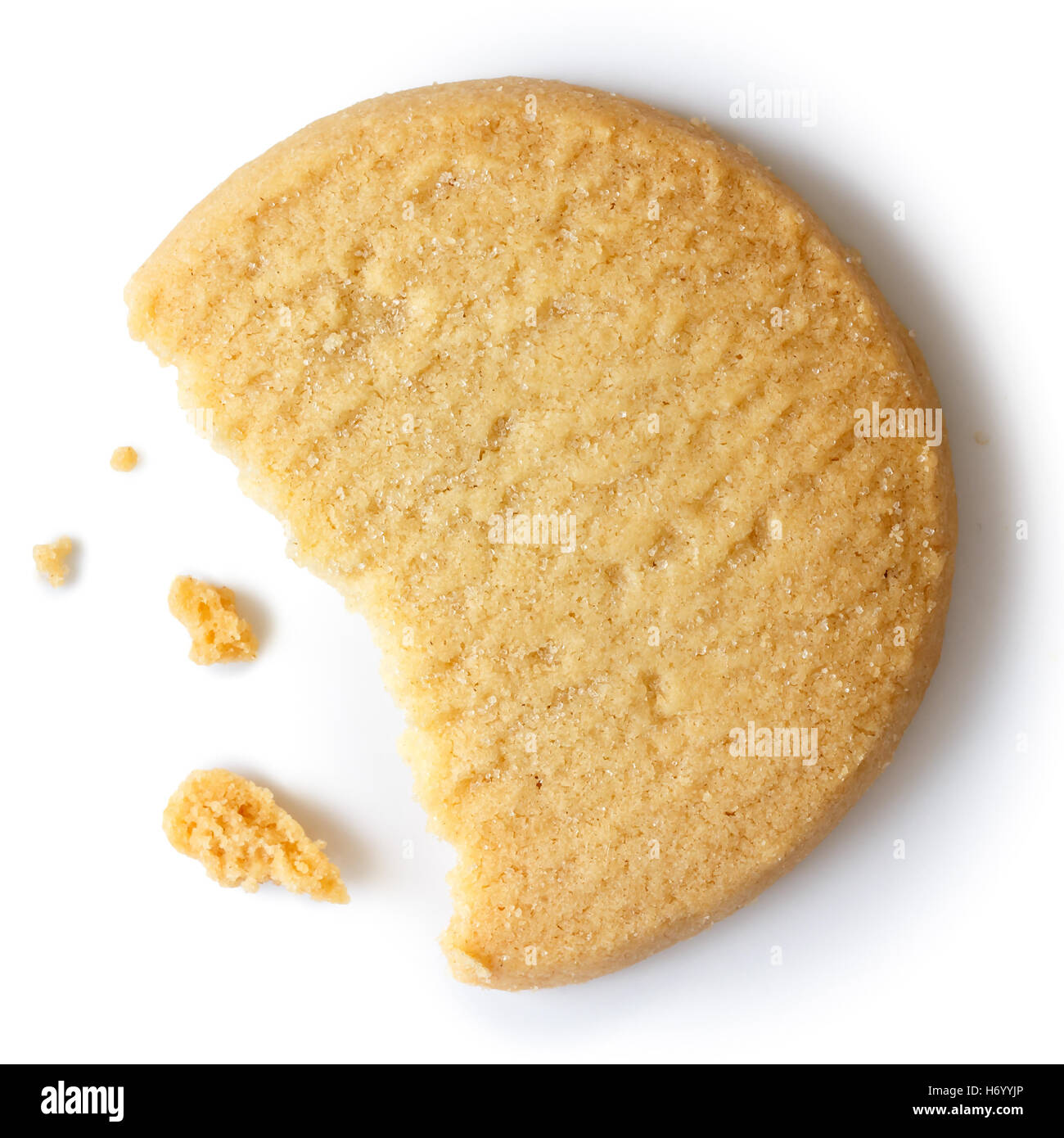 Single round shortbread biscuit with crumbs and bite missing. From ...